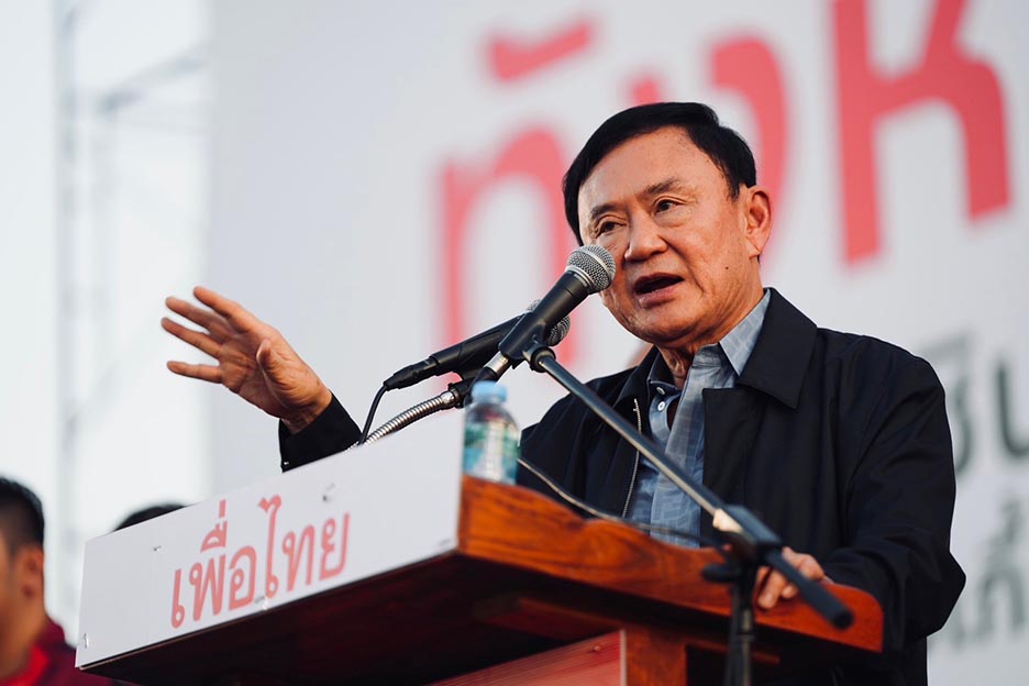 Thaksin Returns to Political Stage Red Shirt Stronghold After 18 Years