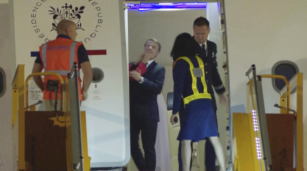 France’s First Lady Seems To Push Her Husband as They Land in Vietnam ...