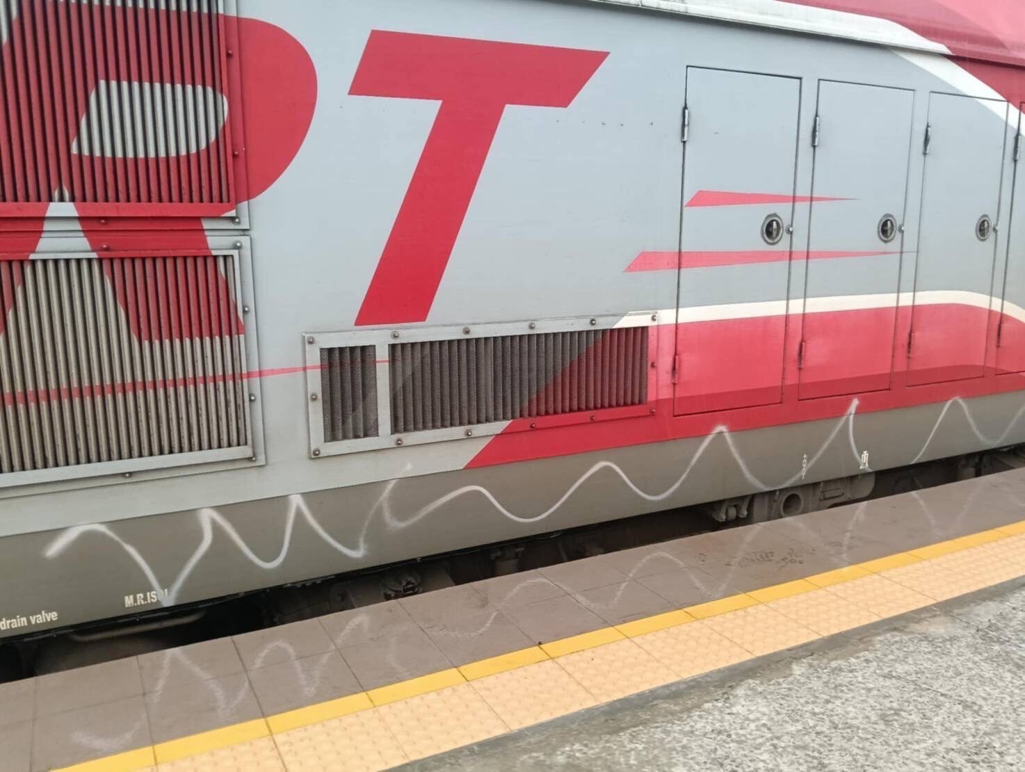 Japanese Tourists Caught Red-Handed Spray-Painting Train in Bangkok