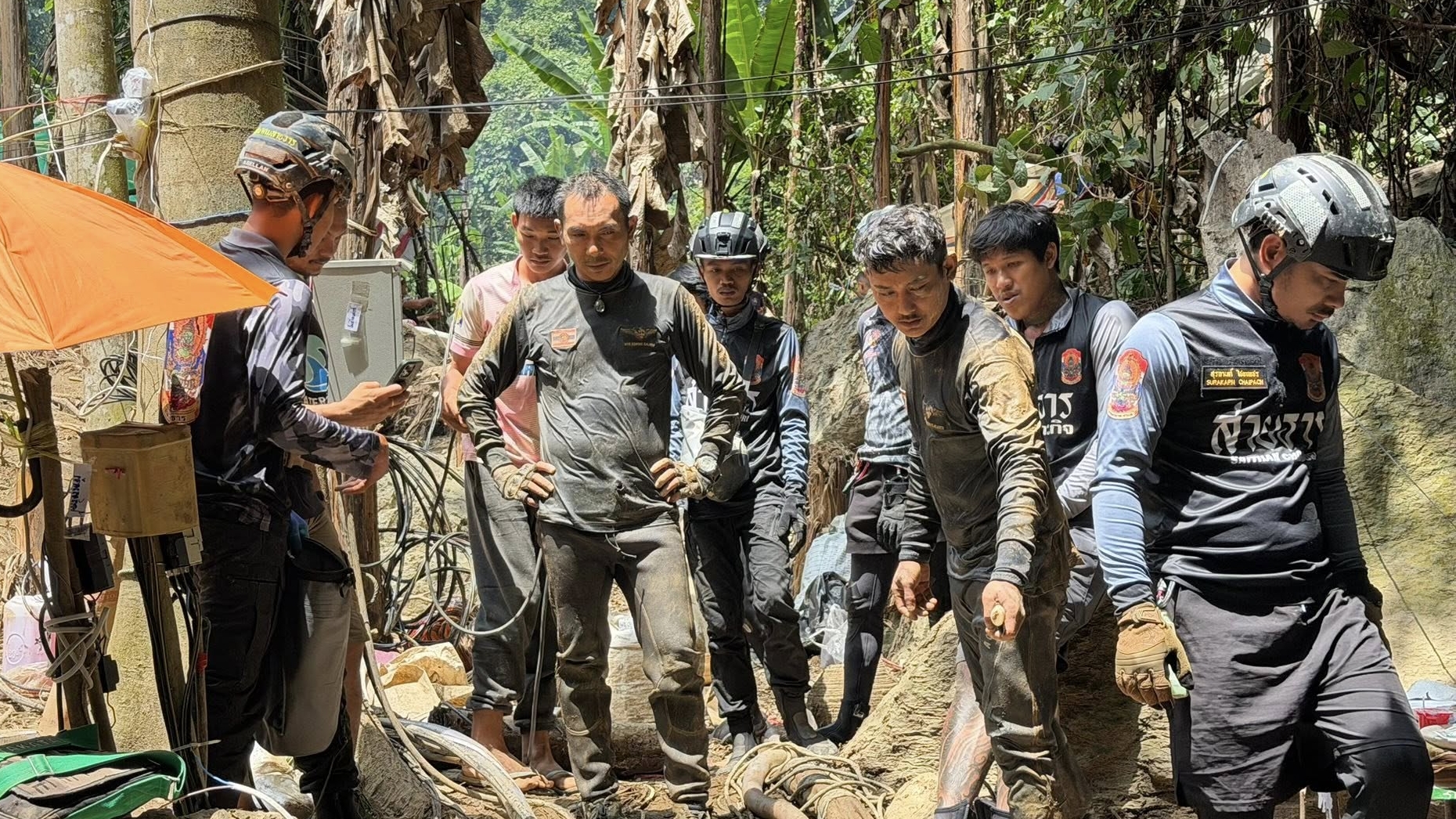 Rescuers call off search for two trapped in Laos cave after floods and ...